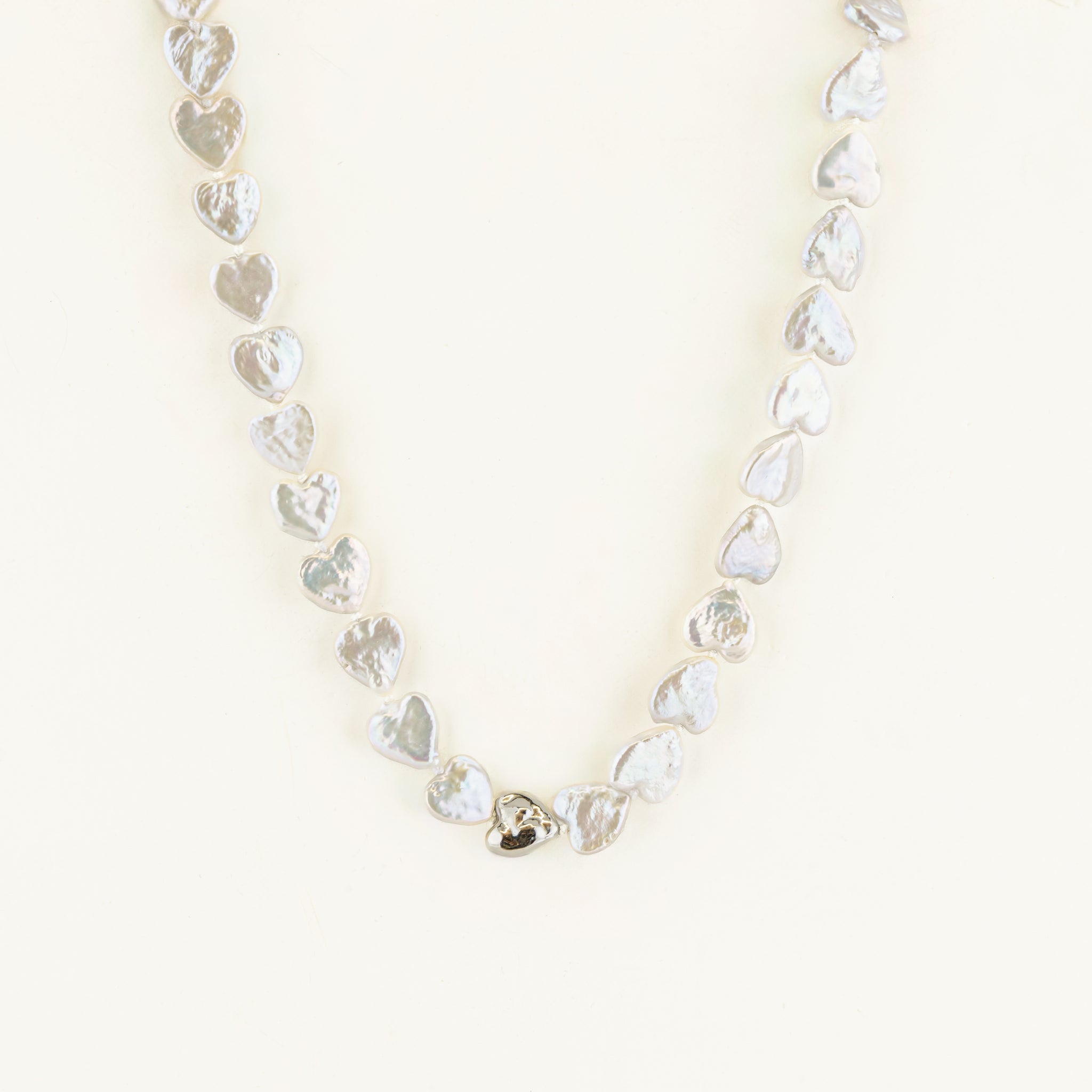 Collier de perles coeur